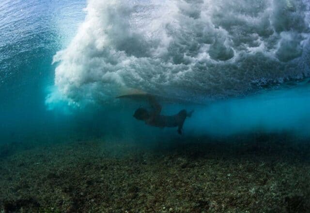 How To Turtle Roll on a Surfboard - | GetFoamie.com